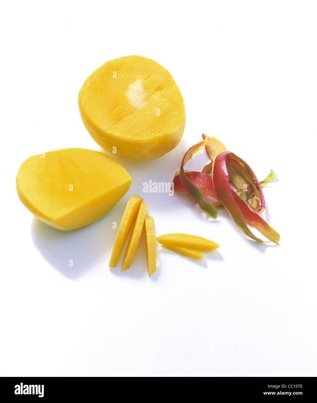 Cut out Mango Step: Peel mango, cut flesh into slices Stock Photo - Alamy