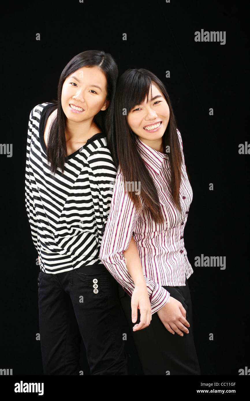 Happy Asian girl friends Stock Photo - Alamy