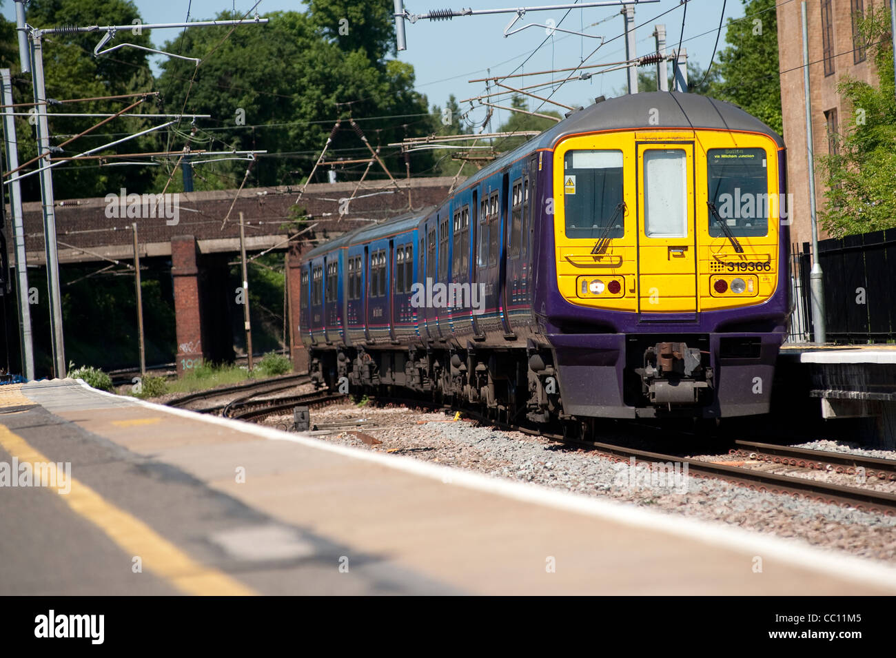 Passenger train in First Capital Connect livery pulling into a railway ...