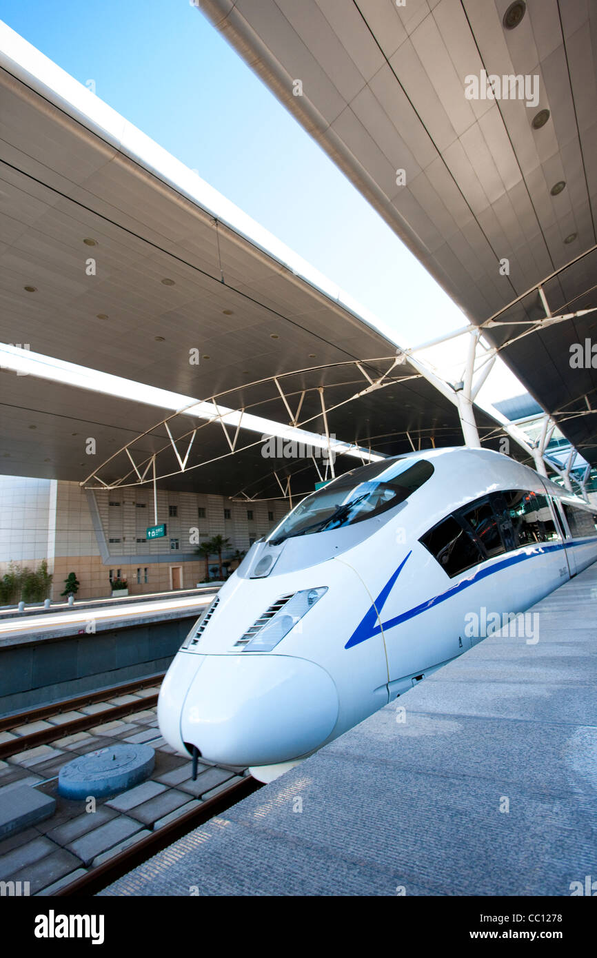 High speed train in station Stock Photo - Alamy