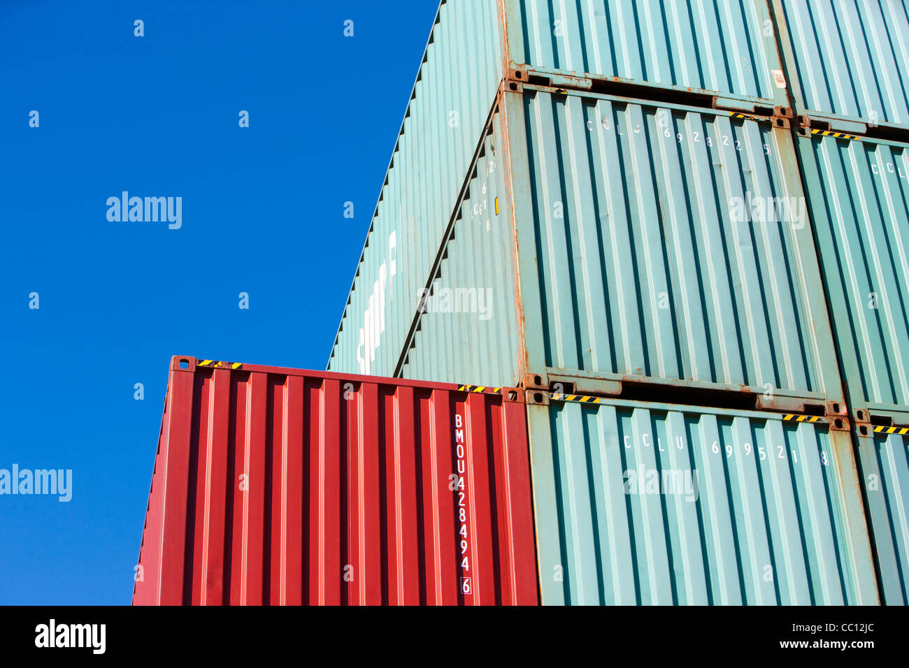 Cargo containers in shipping dock Stock Photo - Alamy