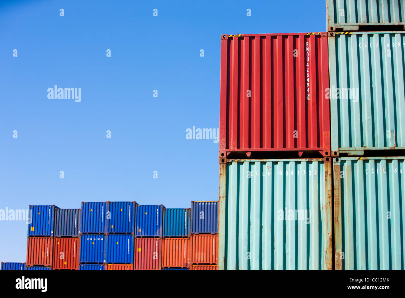 Cargo containers in shipping dock Stock Photo - Alamy