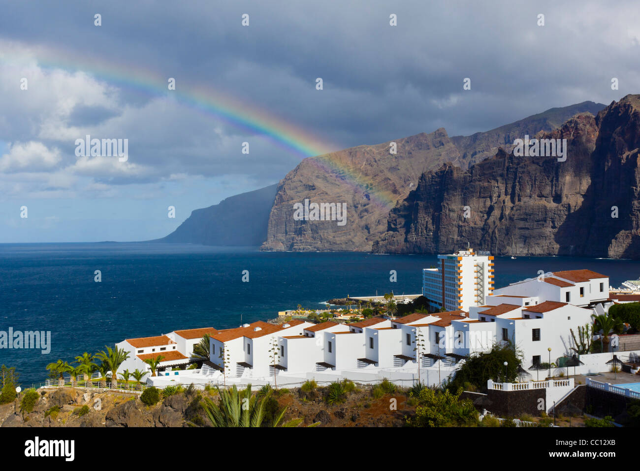 Los Gigantes, Tenerife. Rainbow from Masca Bay over the ocean Stock ...