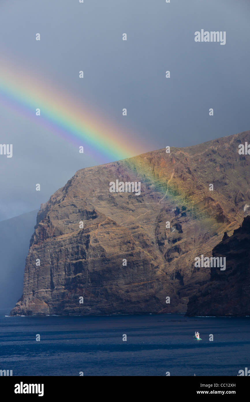 Los Gigantes, Tenerife. Rainbow from Masca Bay over the ocean Stock ...