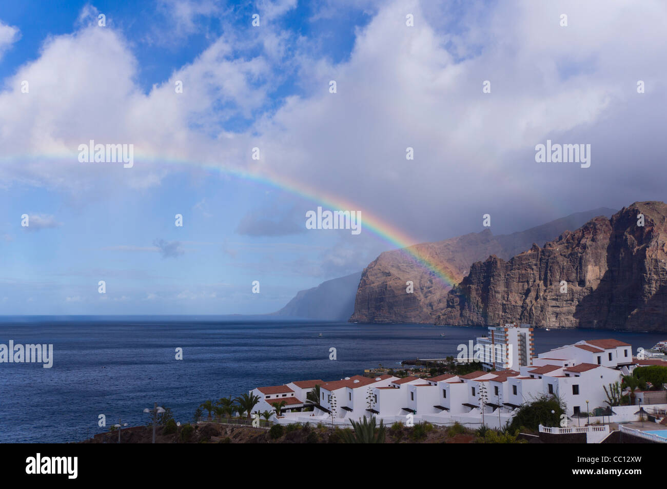 Los Gigantes, Tenerife. Rainbow from Masca Bay over the ocean Stock ...
