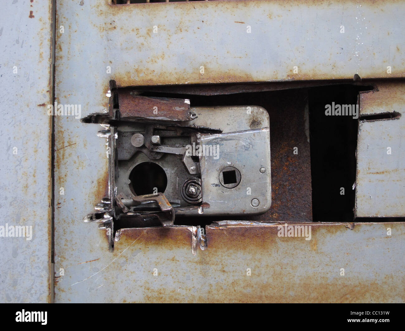 damaged lock on metal steel gate door Stock Photo - Alamy