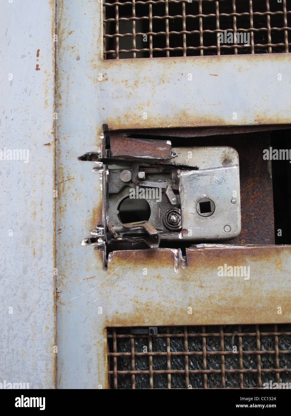 damaged lock on metal steel gate door Stock Photo - Alamy