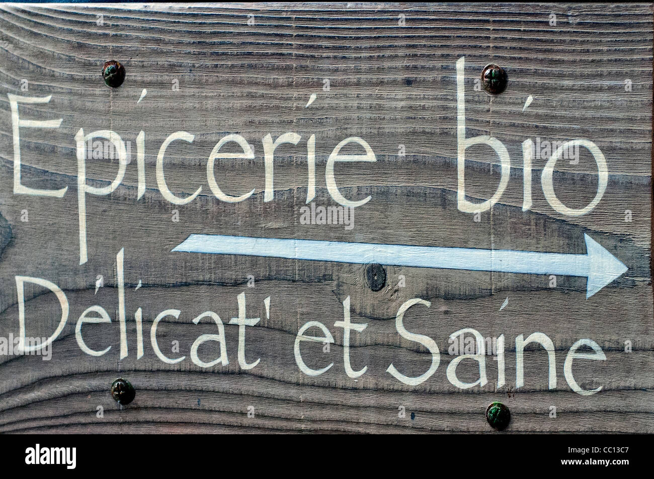 Signpost in French for Organic grocery store Stock Photo - Alamy