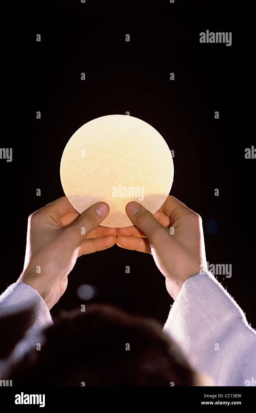 Consecration of The Eucharist During Mass Stock Photo - Alamy