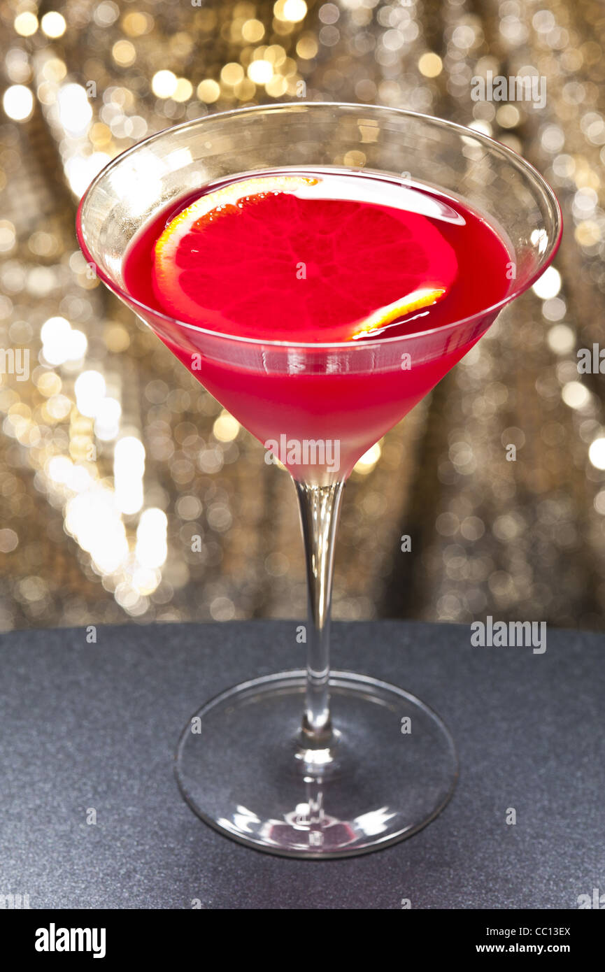 Negroni cocktail in front of colored background Stock Photo - Alamy