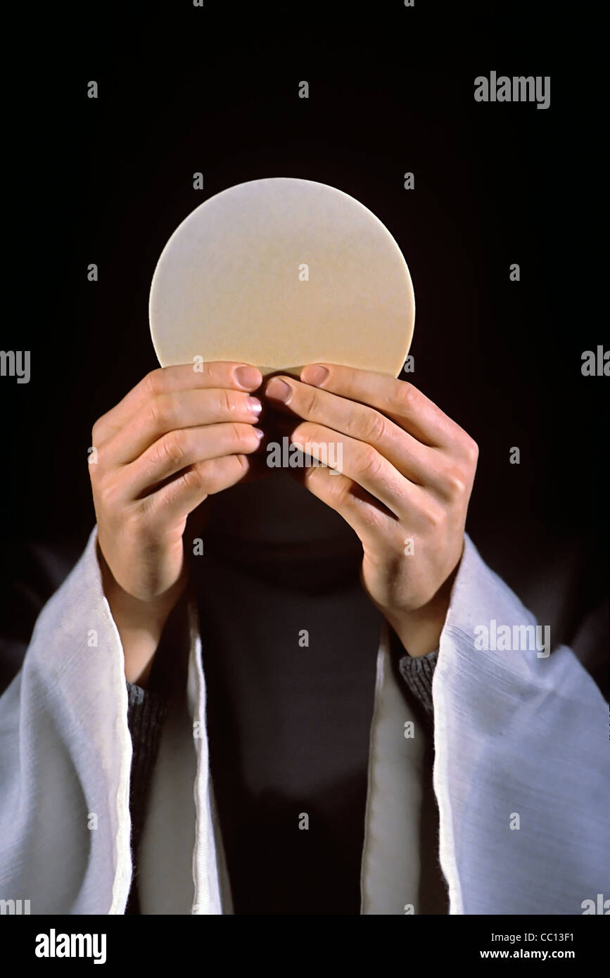 Consecration of The Eucharist During Mass Stock Photo - Alamy