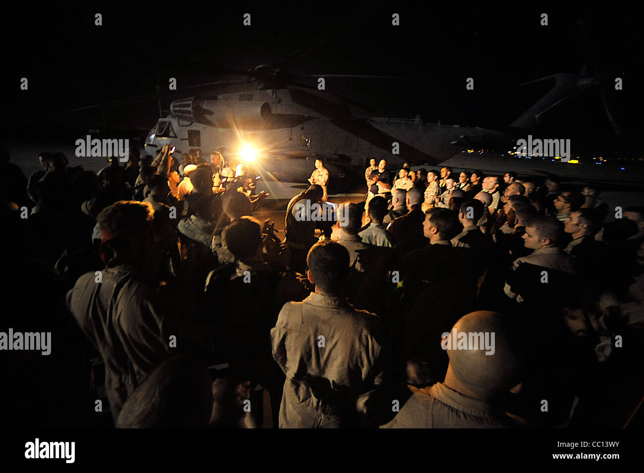 Lt. Col. Gene Becker speaks to the crews and maintainers after the last ...
