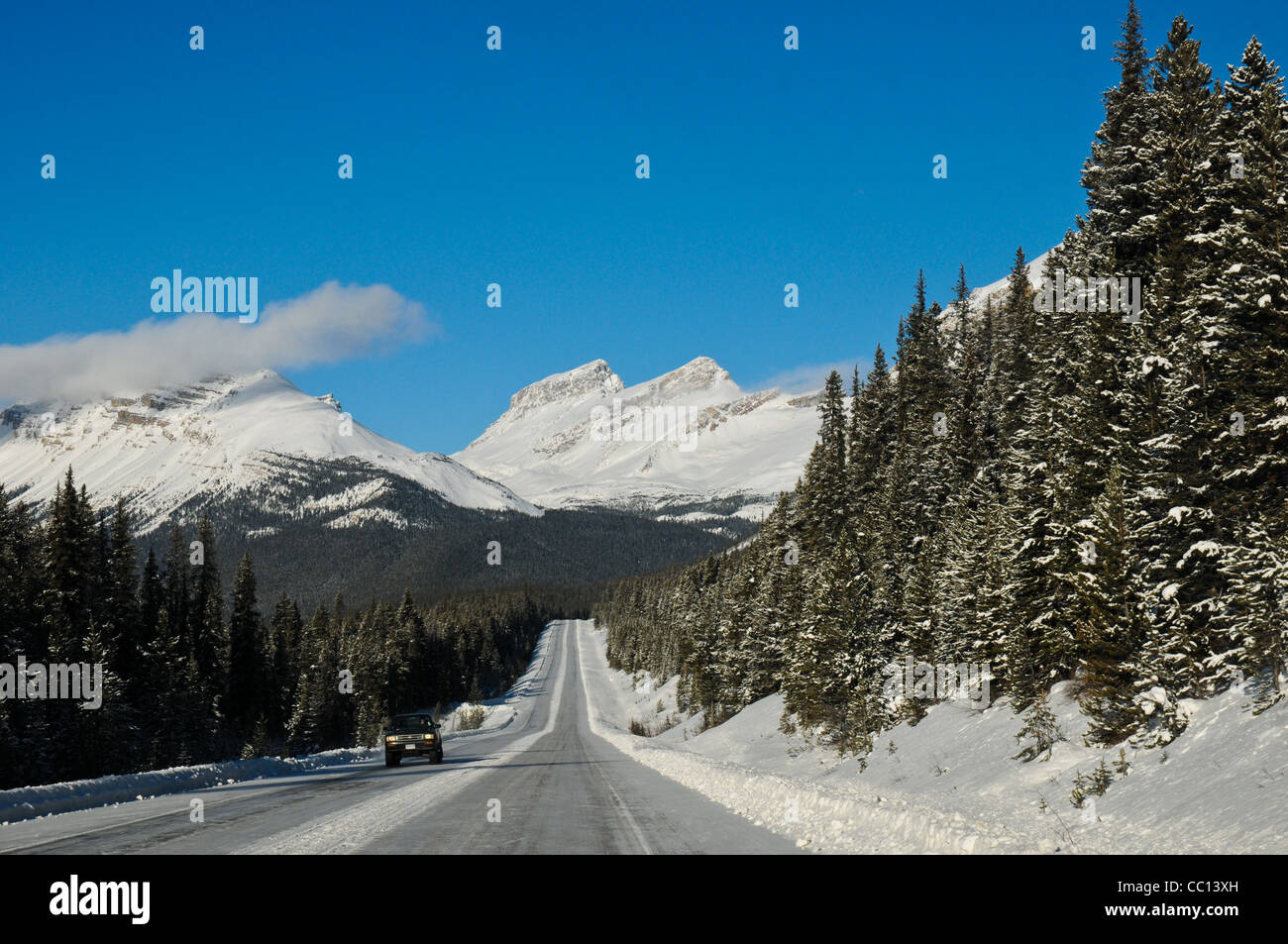 Highway in Winter through mountains little traffic Stock Photo - Alamy