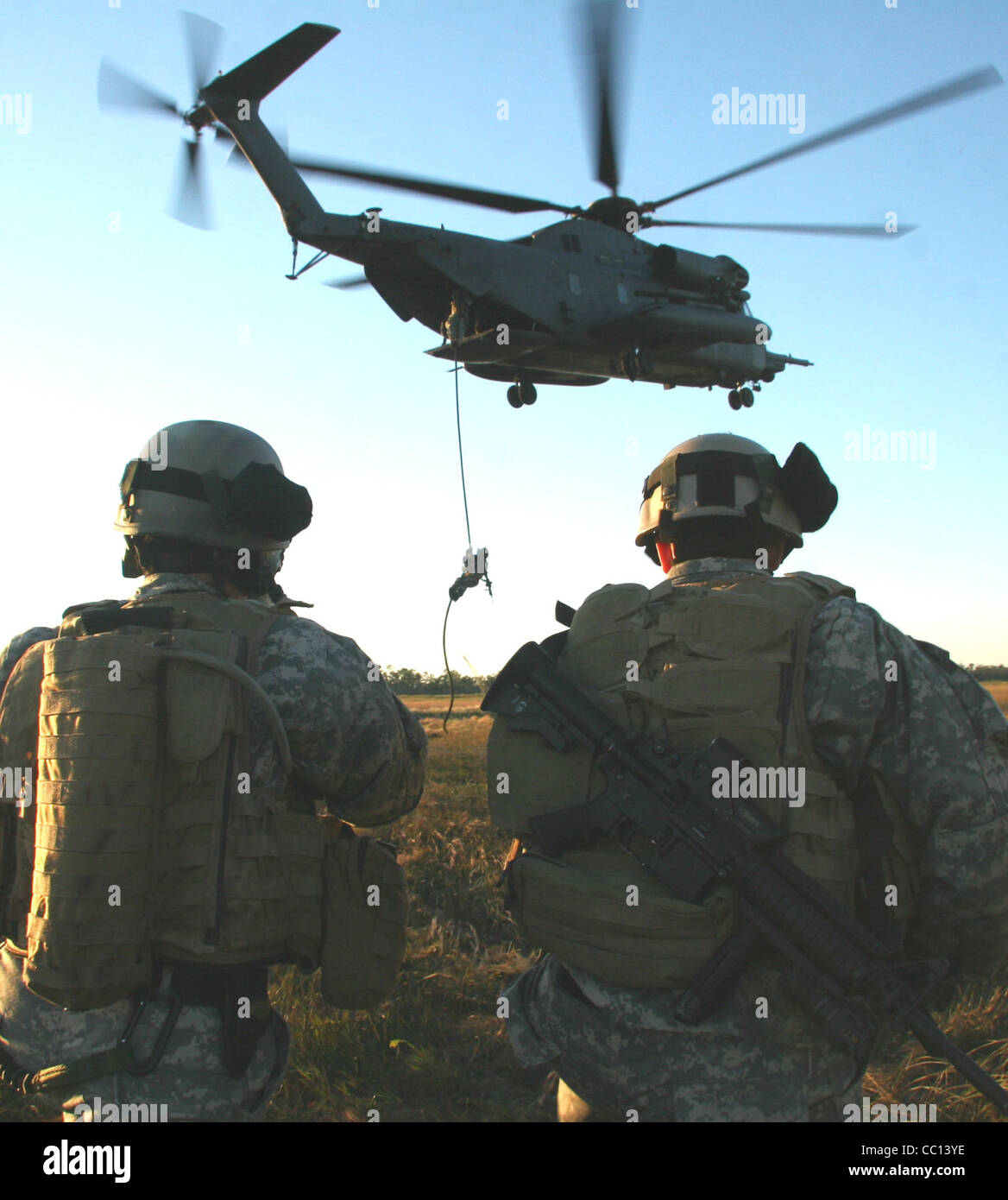Green Berets practice "fast-roping" from the tail of a MH-53 Pave Low ...