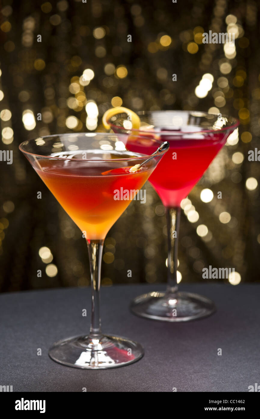 Cosmopolitan cocktail with lemon garnish Stock Photo - Alamy