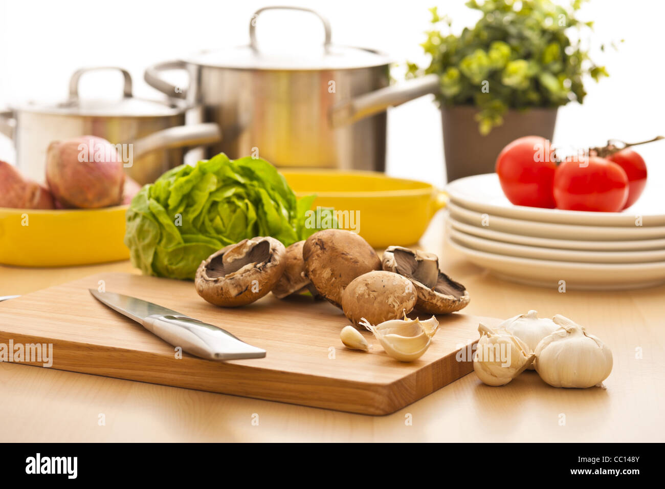 Still life with vegetables and kitchen utensils hi-res stock ...