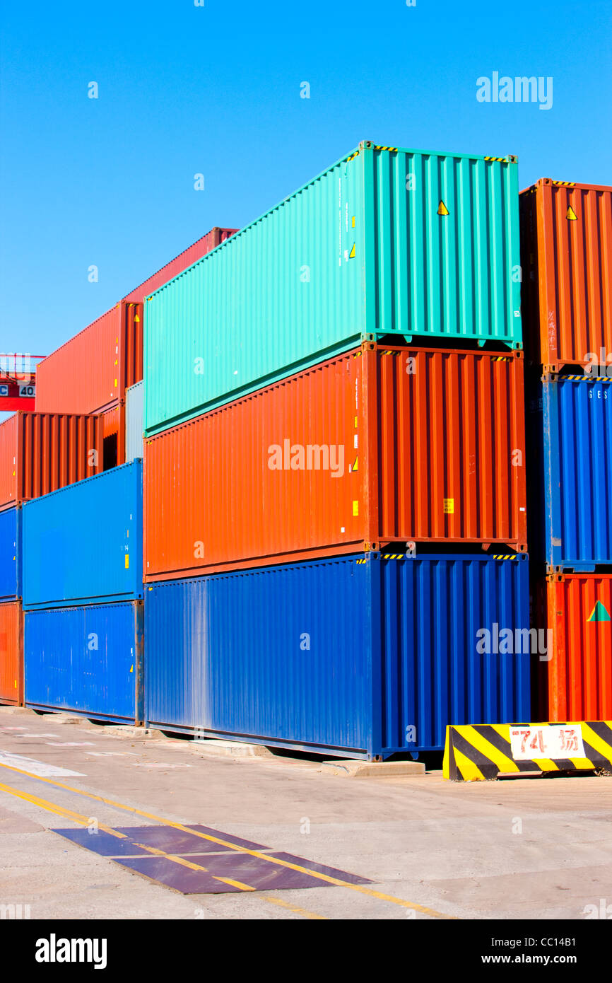 Cargo containers in shipping dock Stock Photo - Alamy