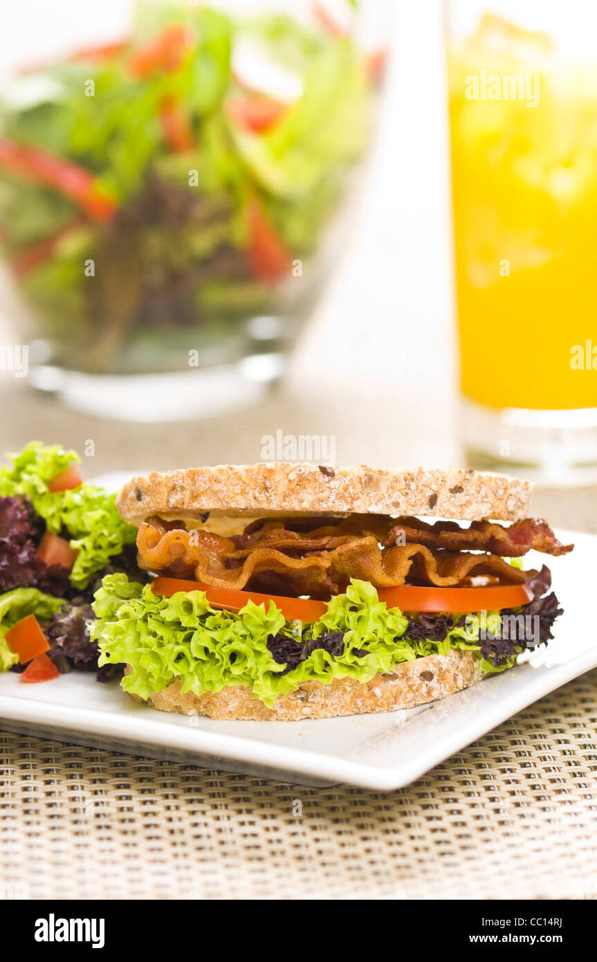 Close-up shoot of a Sandwich with rich Salad in simple setting Stock ...