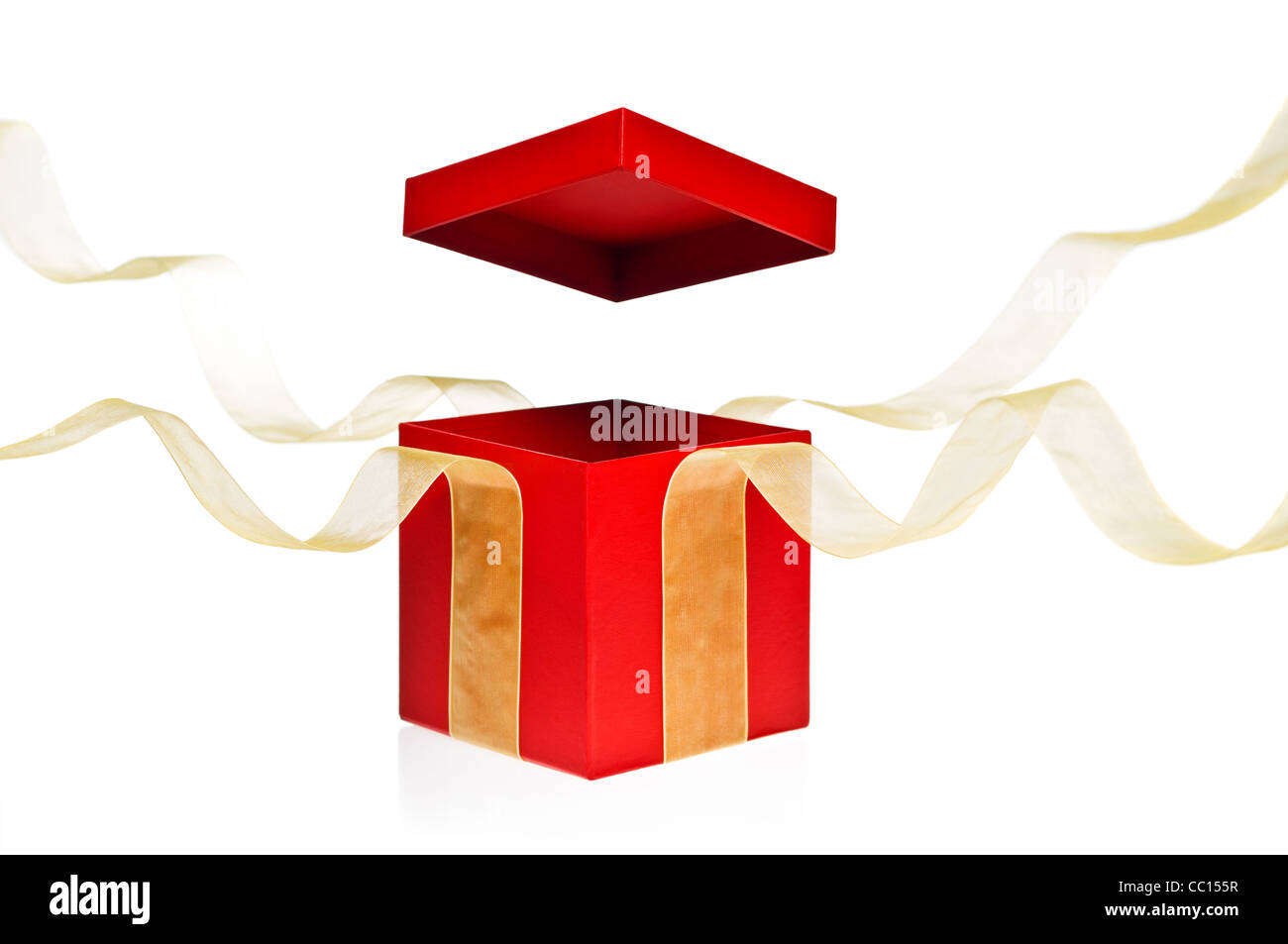 Red Present Box with open cover and yellow flying ribbon Stock Photo ...