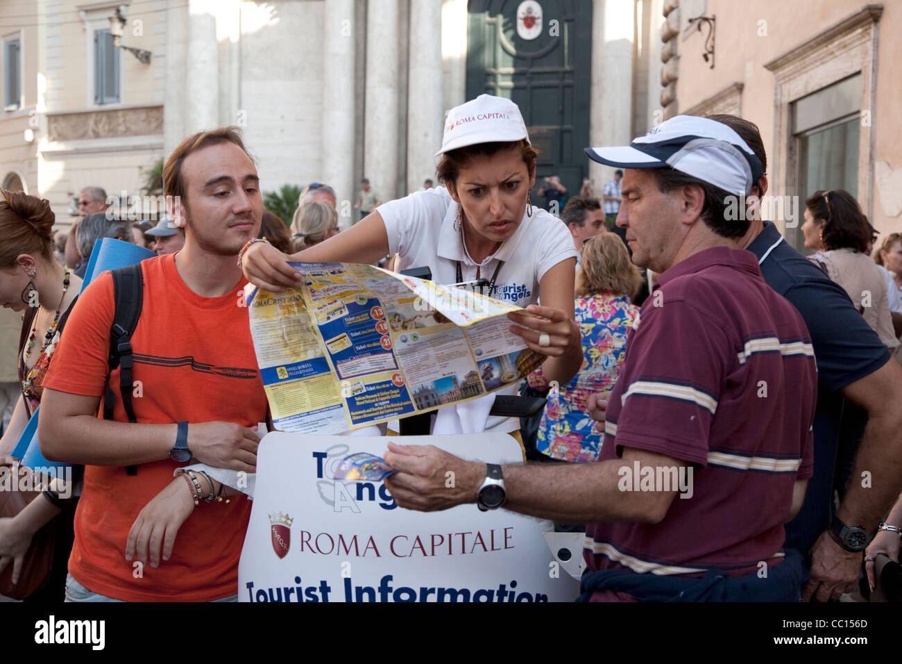 Tourist Guide in Piazza Trevi Square, Rome Stock Photo - Alamy