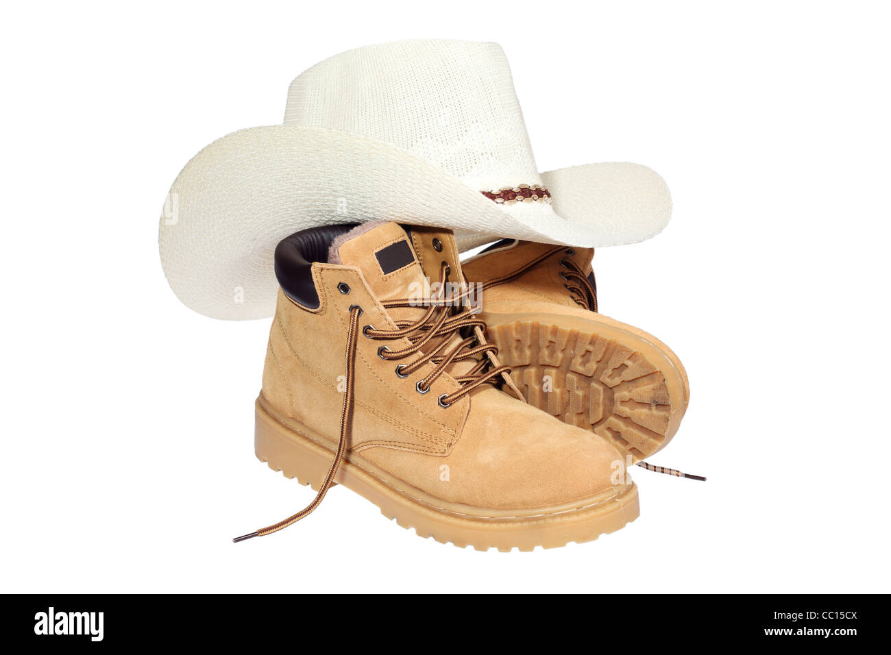 Hiking boots and hat Stock Photo - Alamy