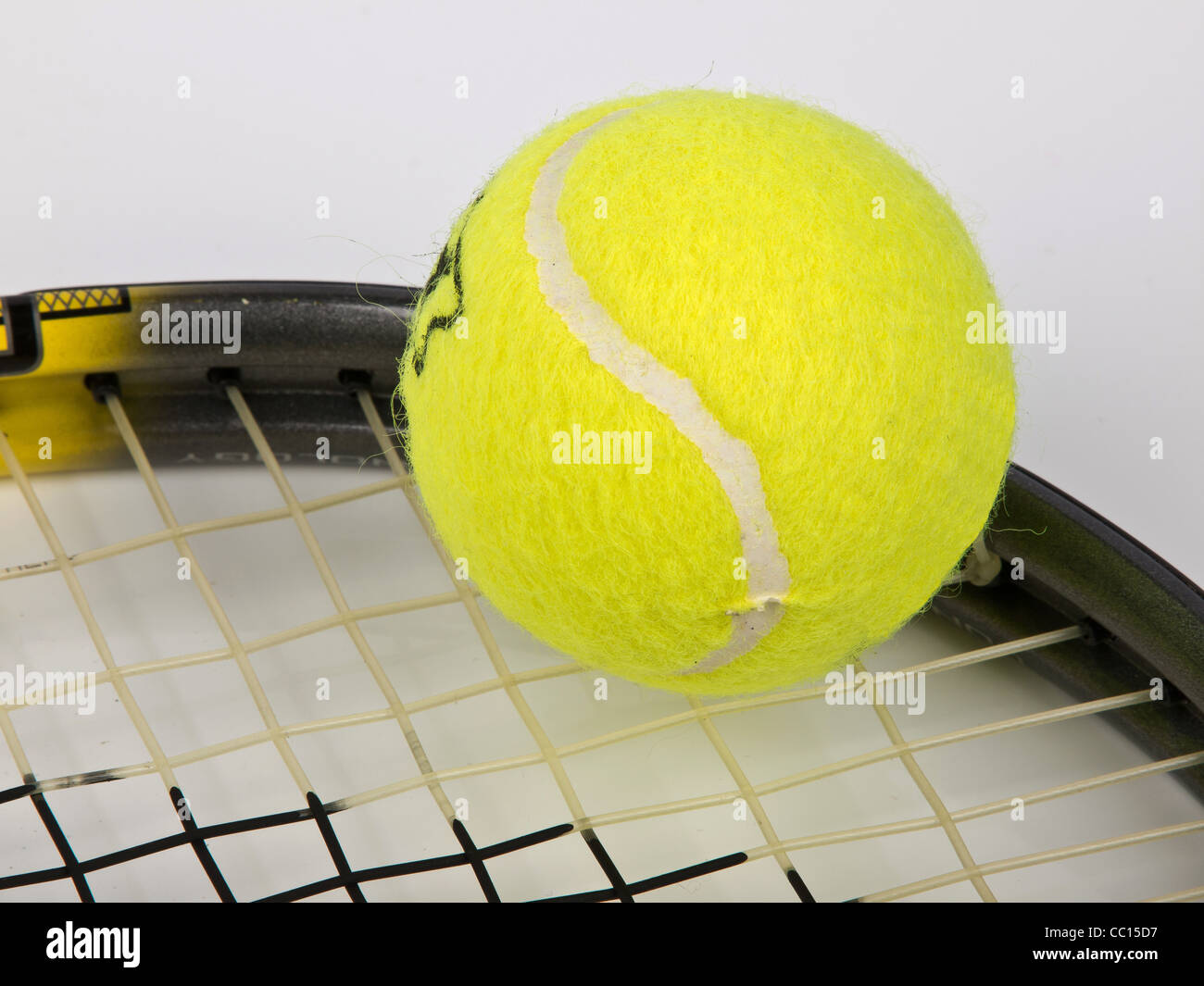 tennis racket with yellow ball Stock Photo - Alamy
