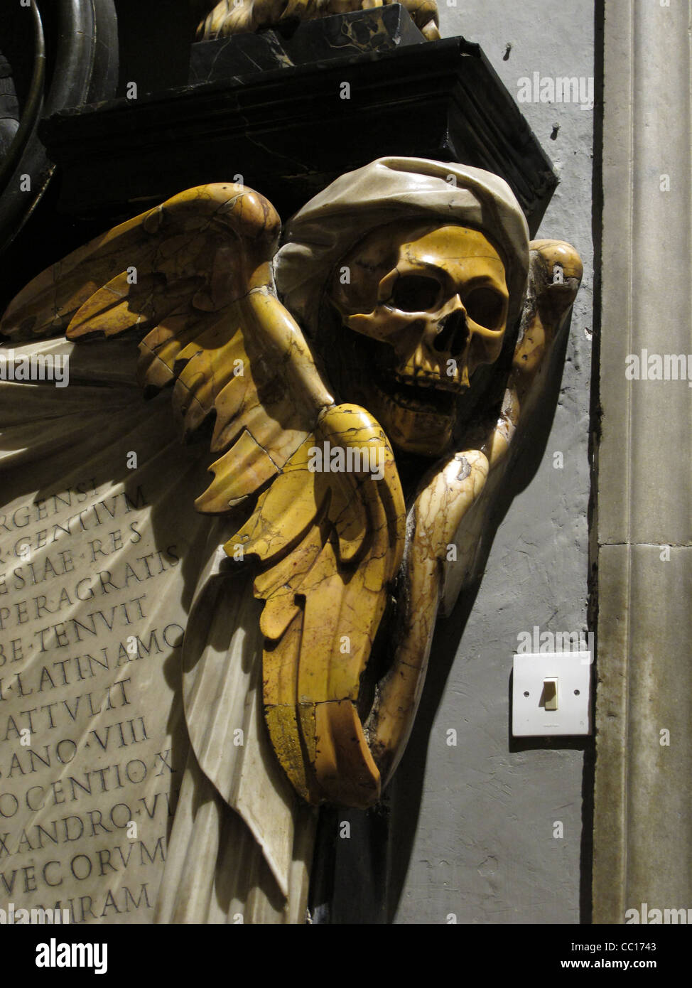 plaque sculpture with human skull in Santa Maria dell'Anima church in ...