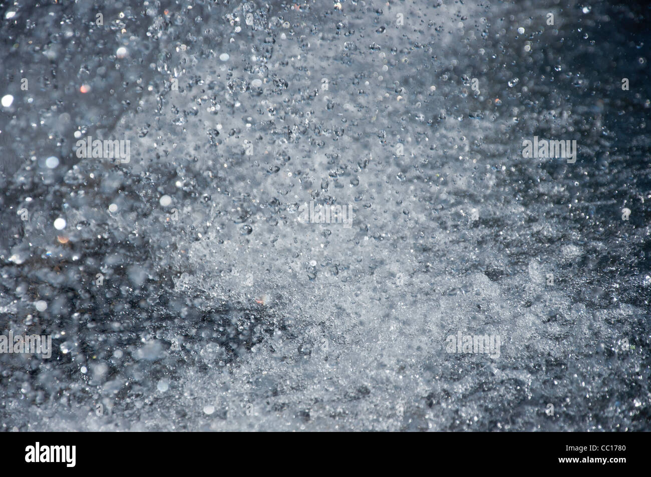 Droplets of a fountain frozen in mid air Stock Photo - Alamy