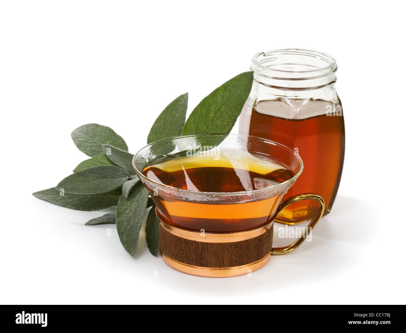 Herbal tea with salvia and honey on white background Stock Photo - Alamy