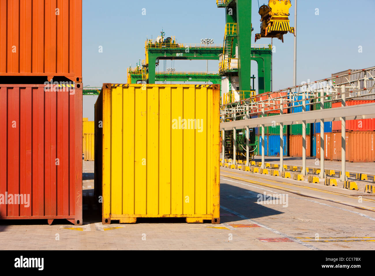 Cargo containers and cranes in shipping dock Stock Photo - Alamy