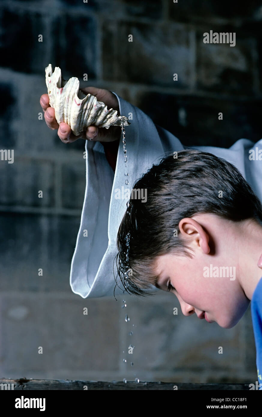 Christian Baptism of Boy Stock Photo - Alamy