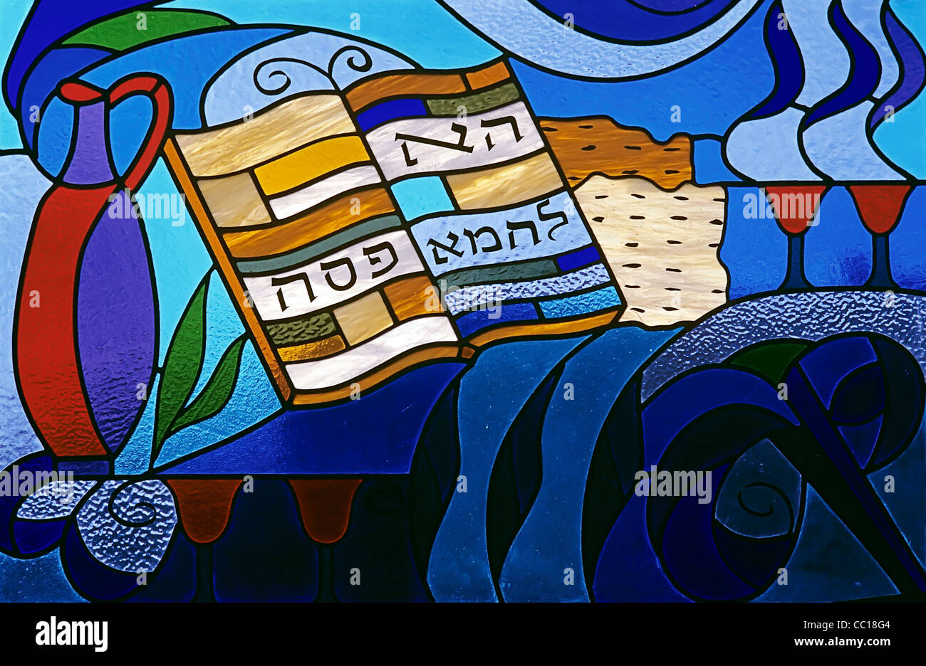 open Passover Haggadah and wine cups - objects related to Passover ...