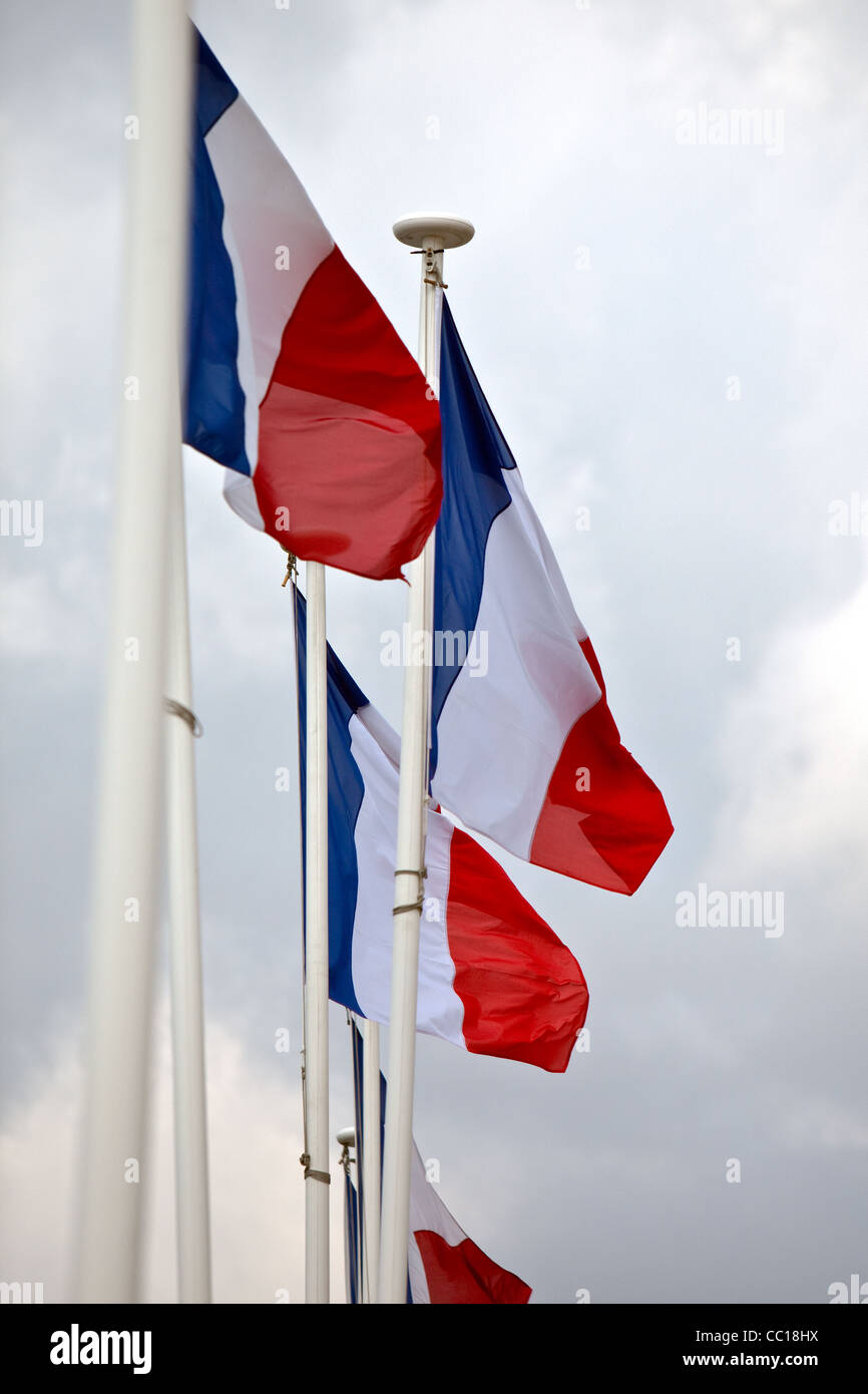 Flag poles with French Tricolor flag flying Toulon France Stock Photo ...