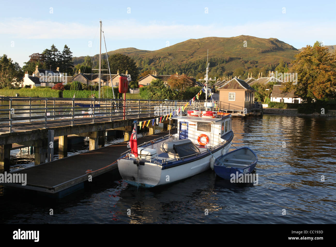 Village of Luss, Scotland. Picturesque early morning view of Luss Pier ...