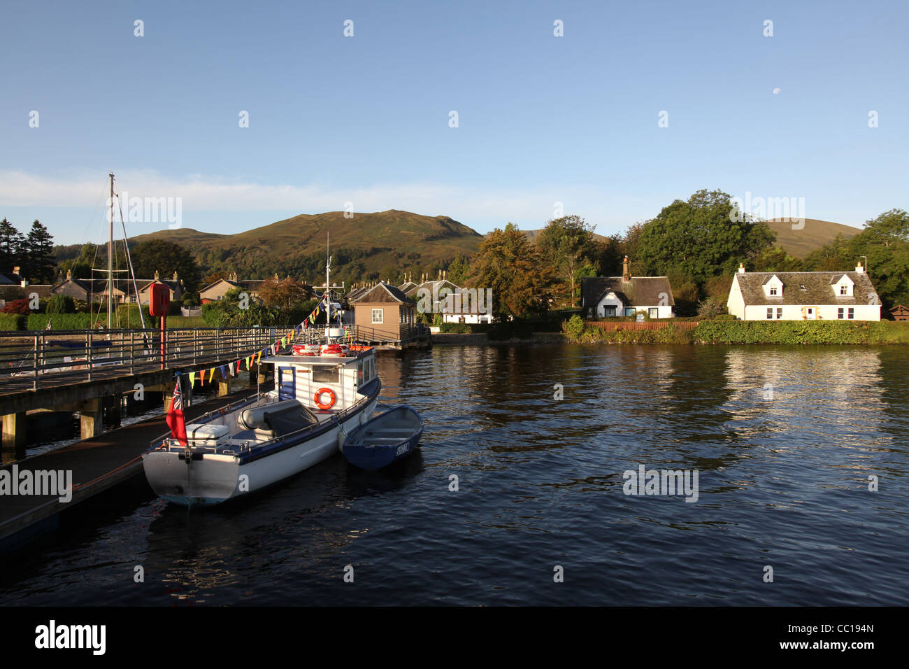 Village of Luss, Scotland. Picturesque early morning view of Luss Pier ...