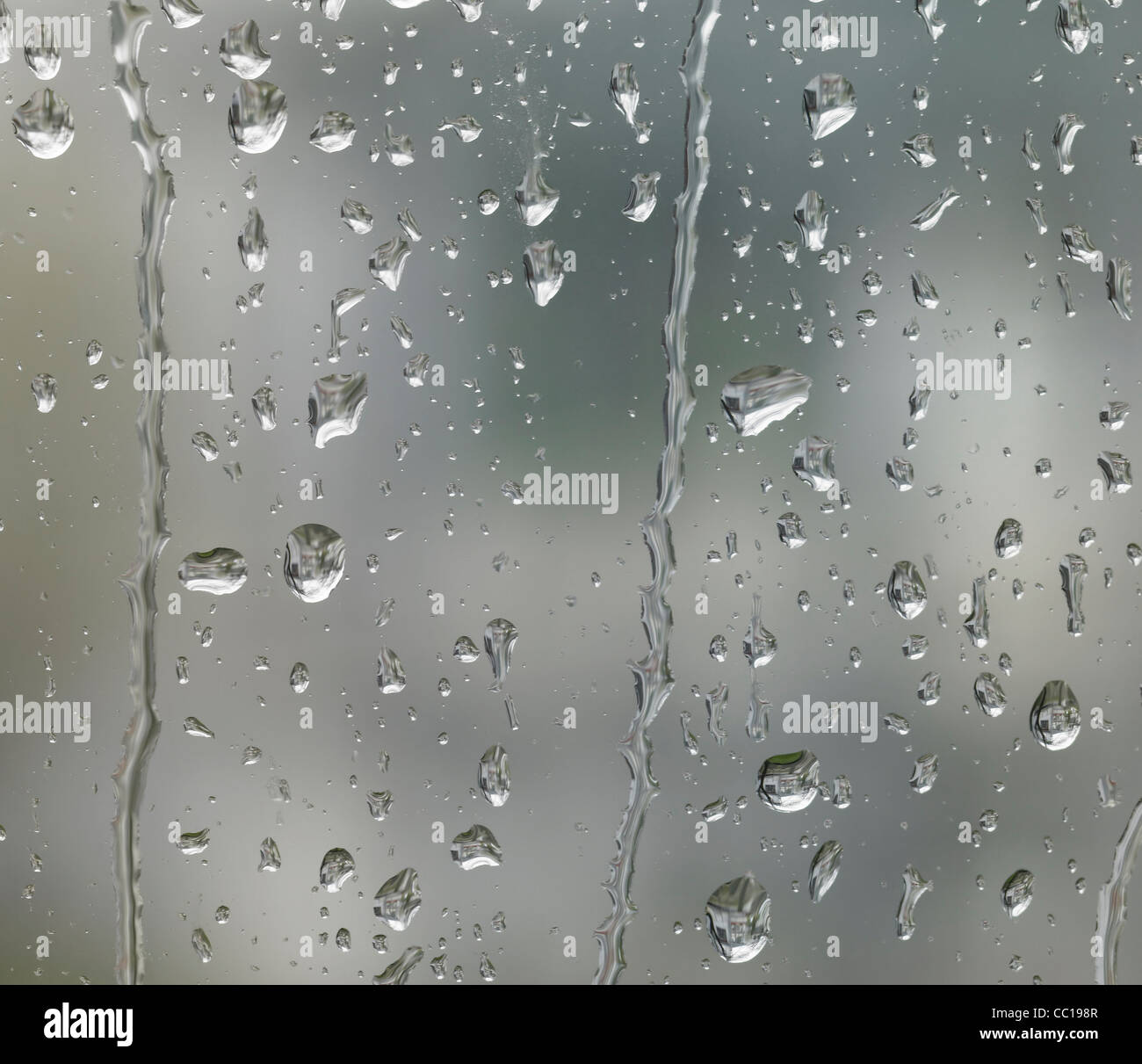 detail of roll off raindrops on window glass Stock Photo - Alamy