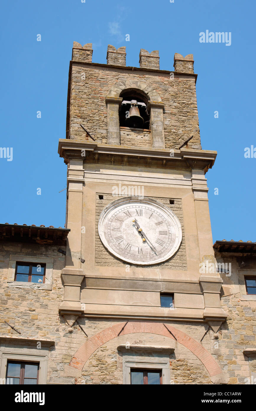 Detail of the 13th century clock tower of Cortona Town Hall in province ...