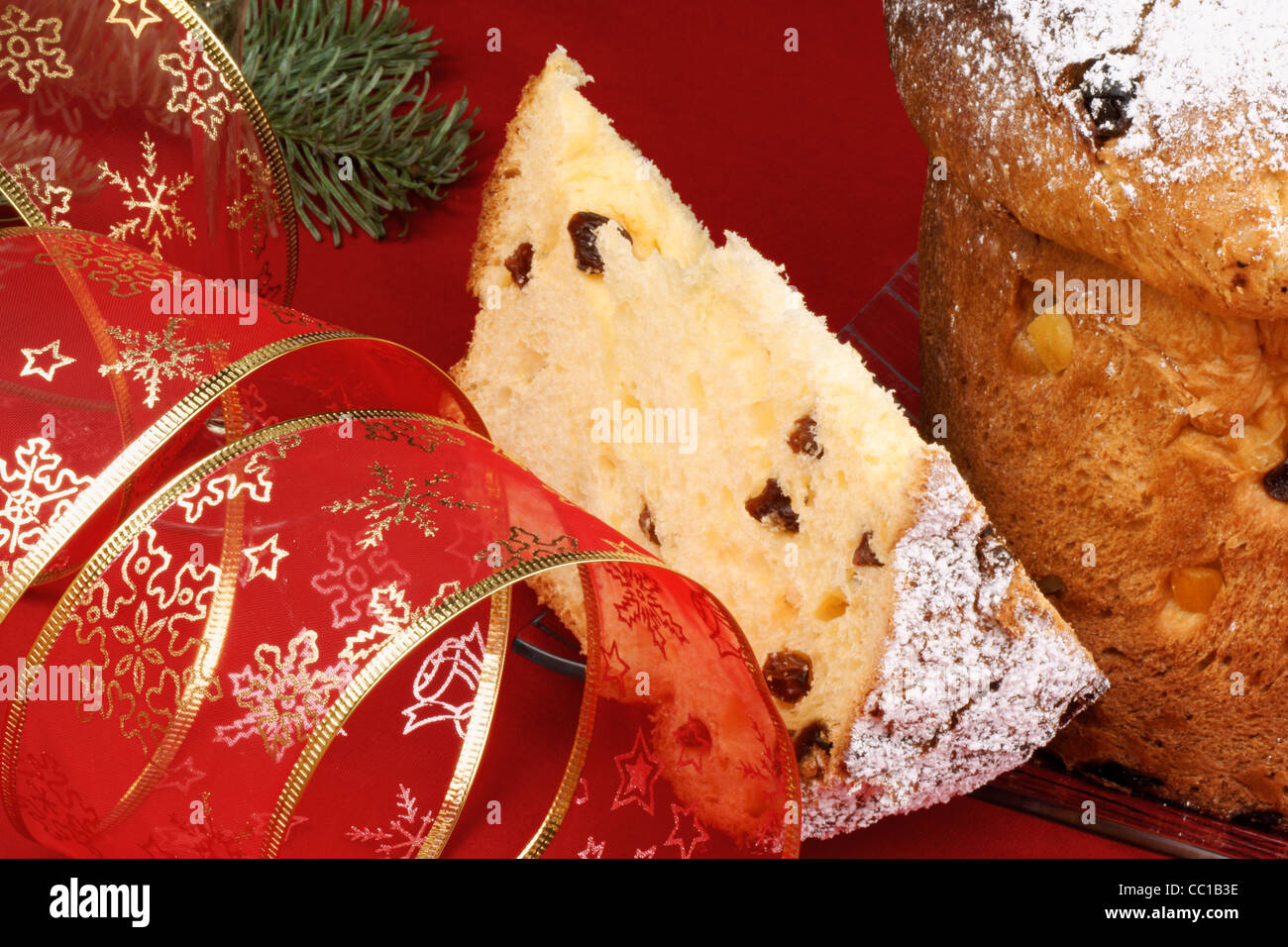 Panettone the italian Christmas fruit cake served on a transparent ...