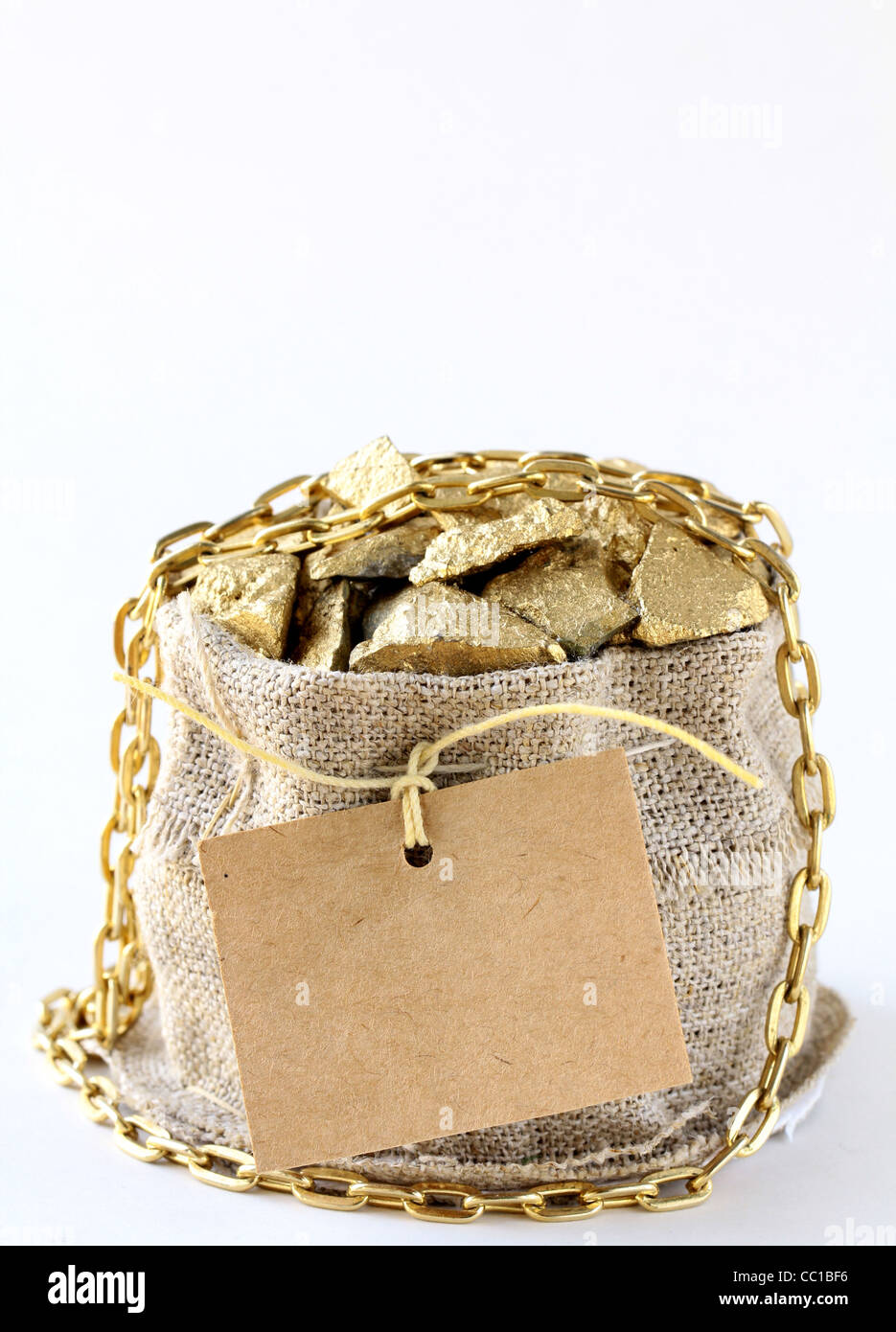 gold nuggets on a small pouch Stock Photo - Alamy