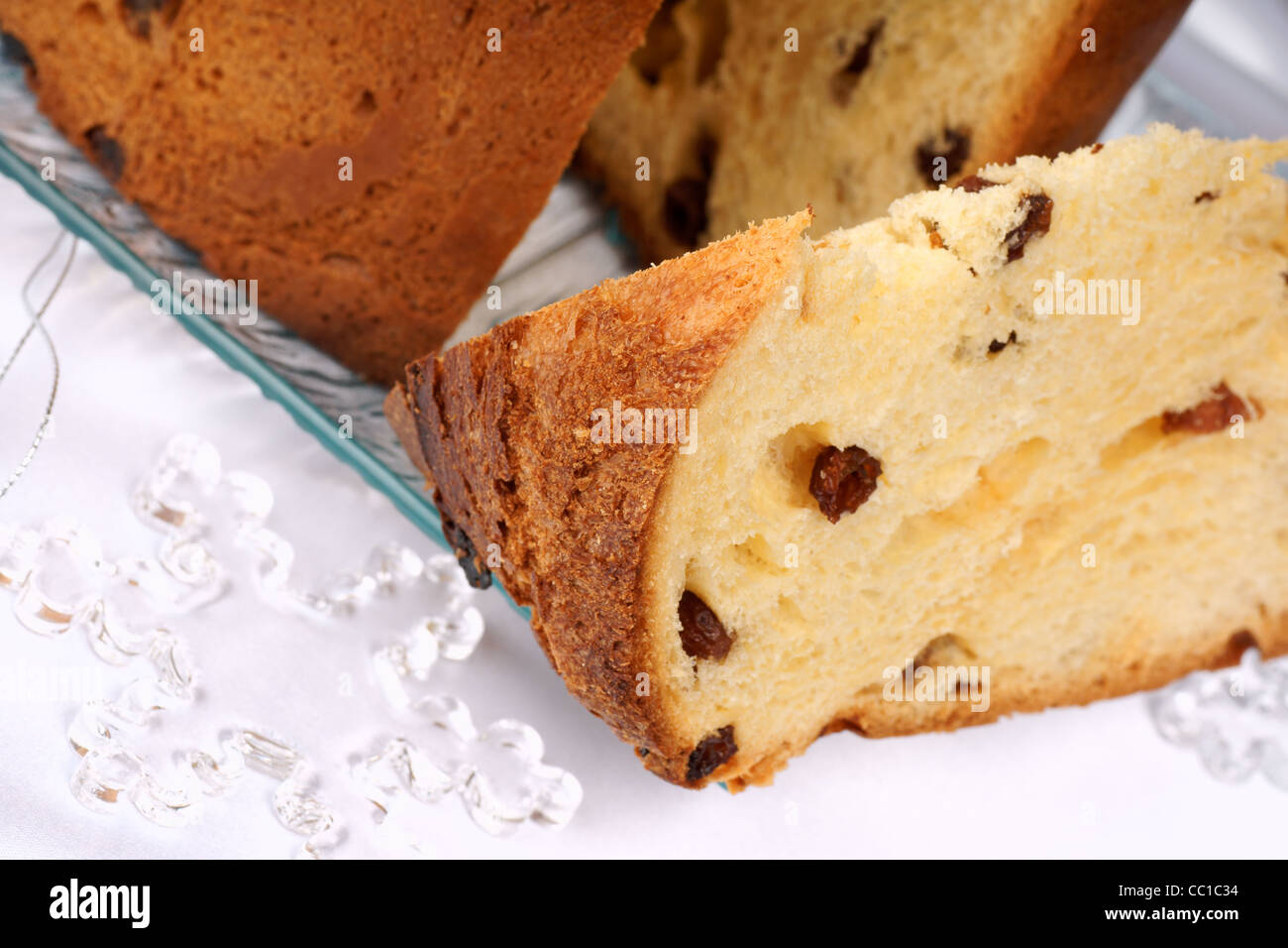 Panettone the italian Christmas fruit cake served on a transparent ...
