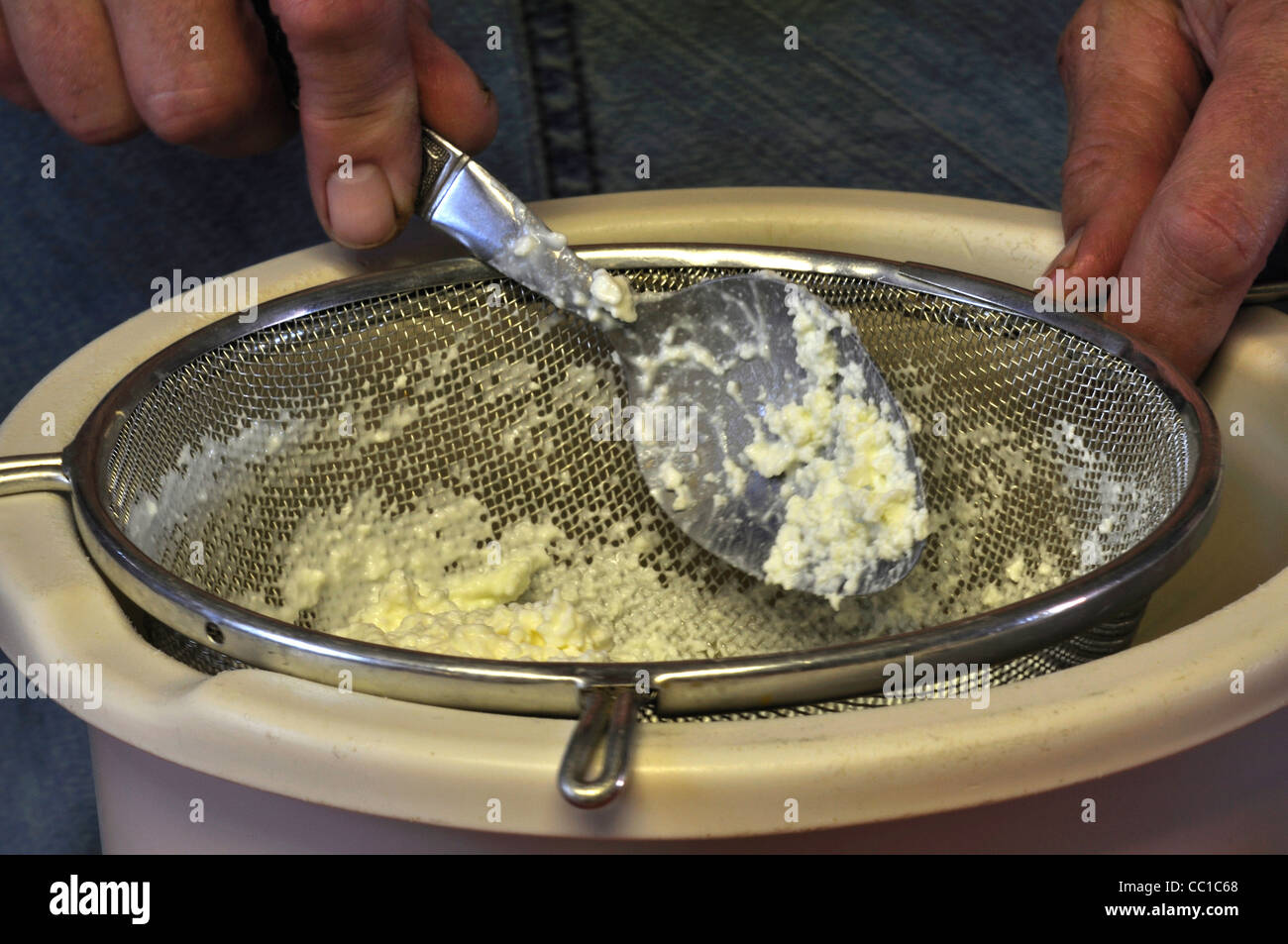 Food preparation - sieving Stock Photo - Alamy
