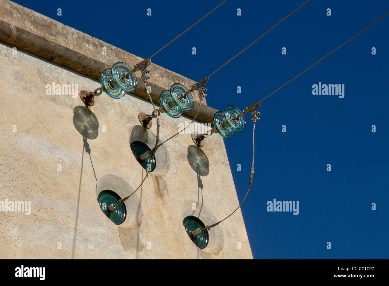 Electric connection power lines with glass insulators old Stock Photo ...