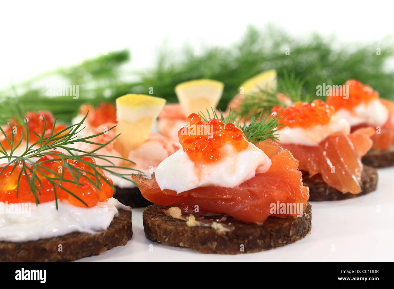 different canapes on a white background Stock Photo - Alamy