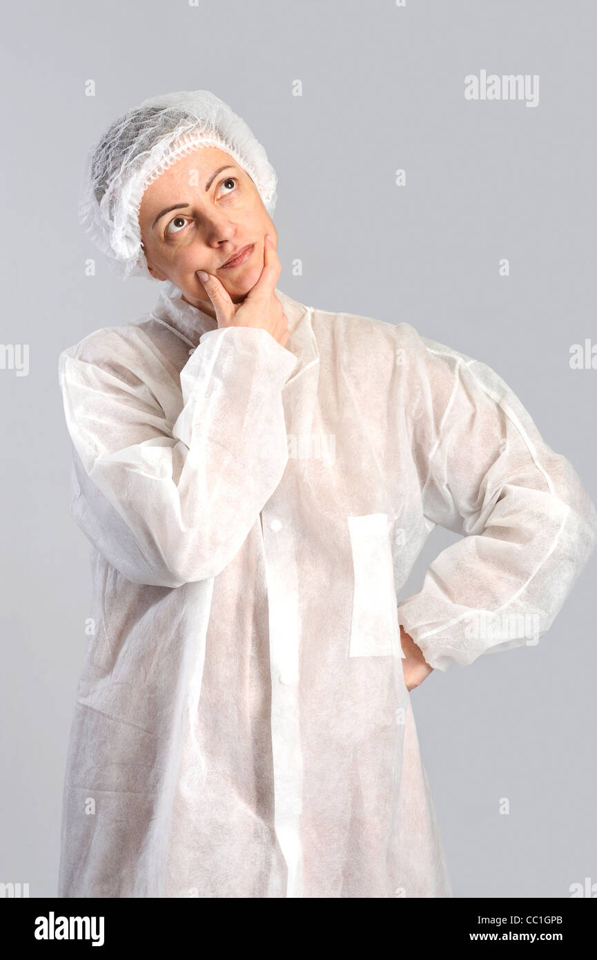 thinking female food factory worker Stock Photo - Alamy