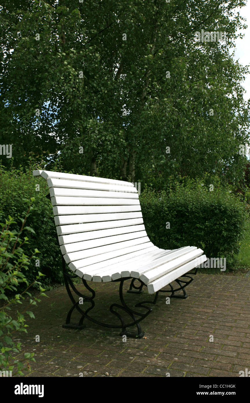 Lonely modern park bench Stock Photo - Alamy