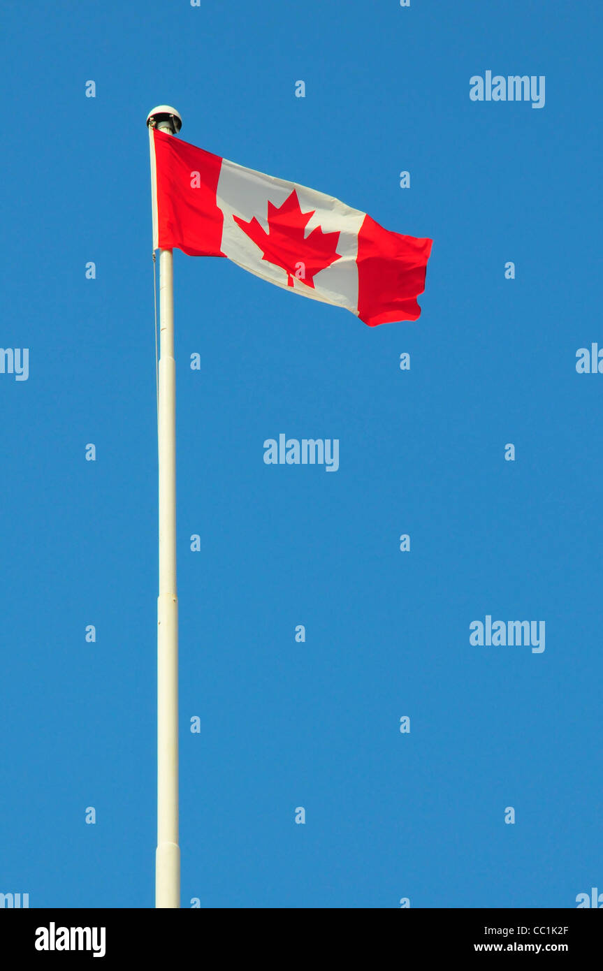 Flagpole with Canadian flag flying Stock Photo - Alamy