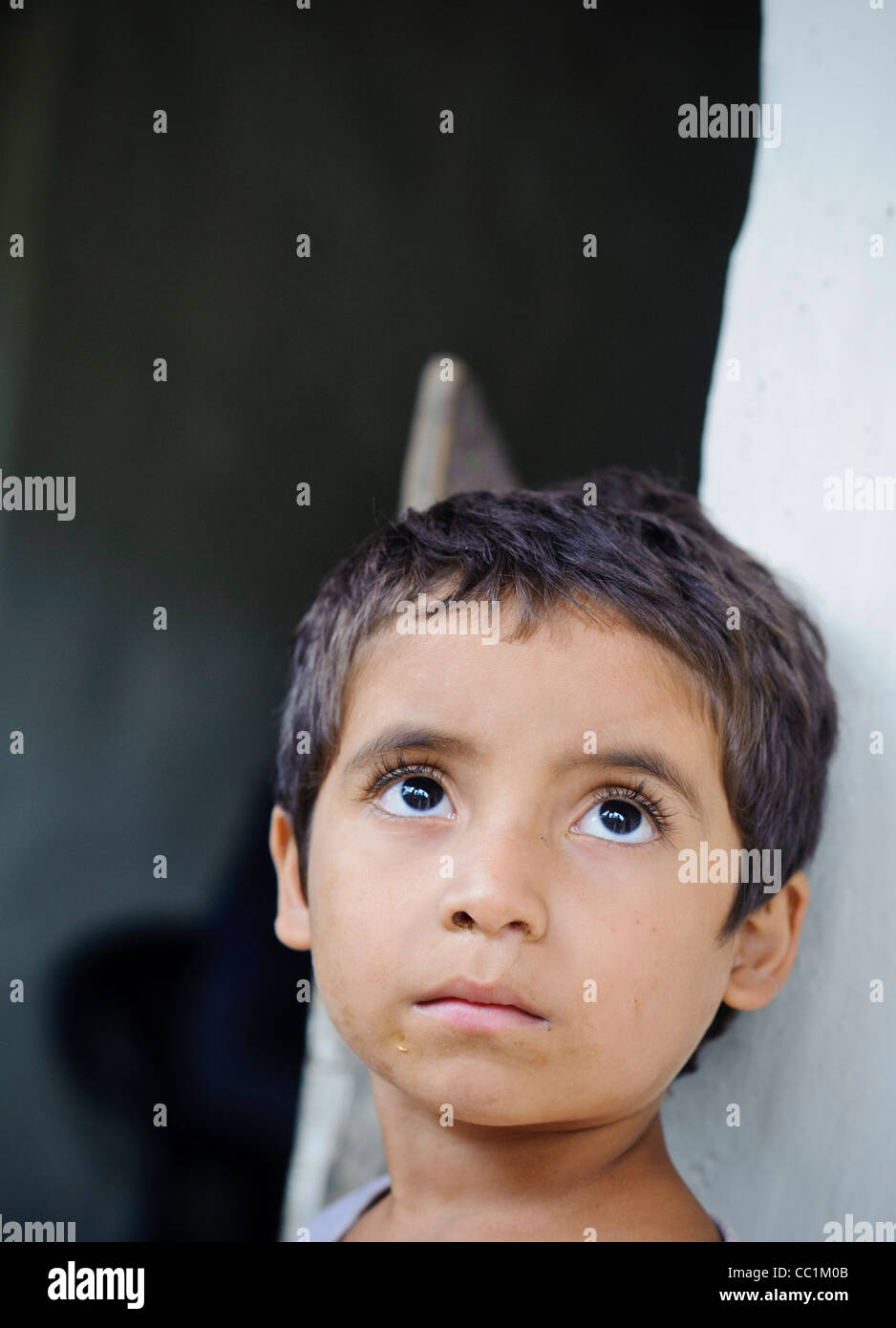 Young boy not smiling in Honduras Stock Photo - Alamy