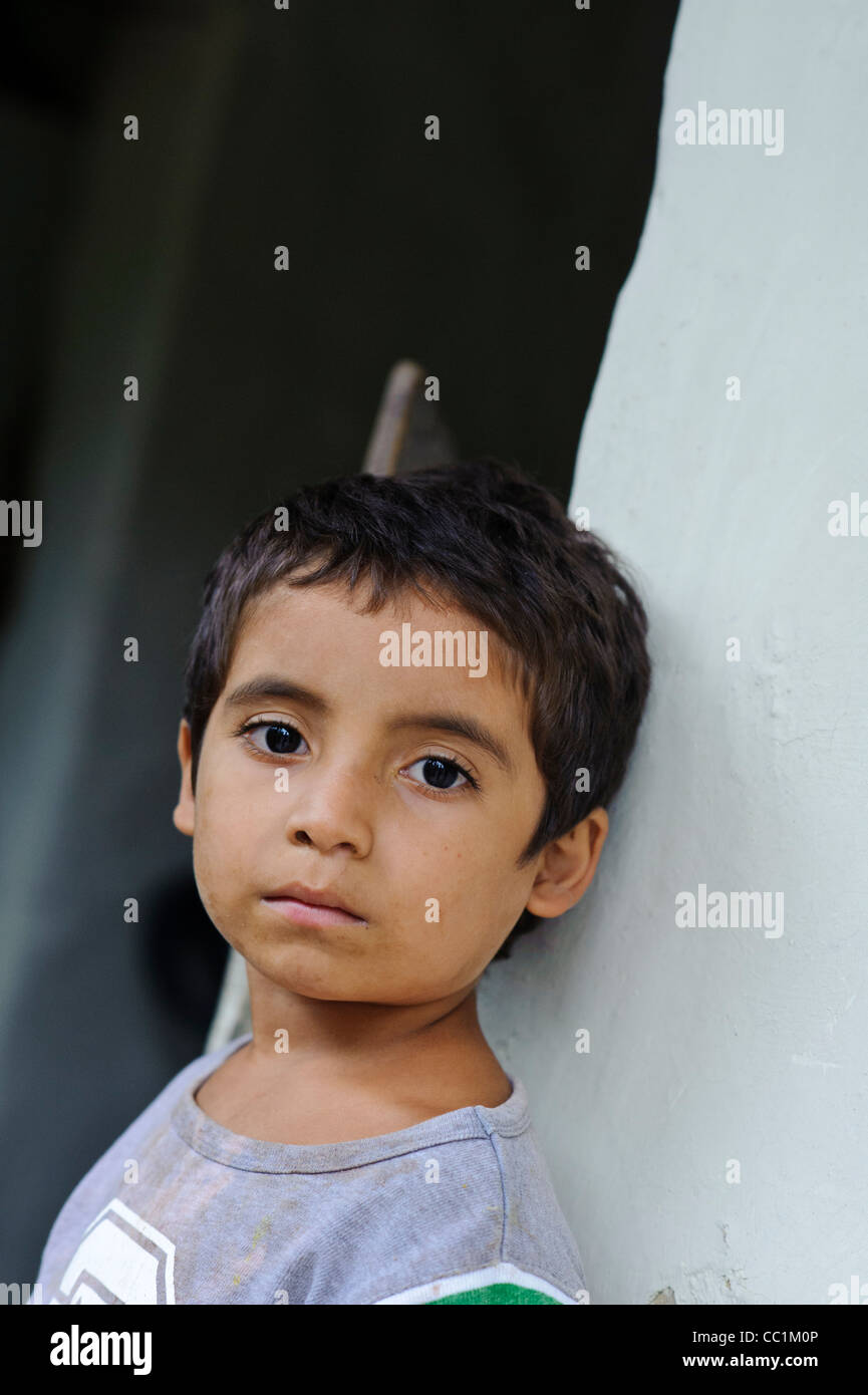Young boy not smiling in Honduras Stock Photo - Alamy
