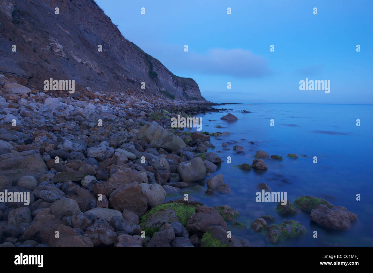 This rugged, rocky, boulder strewn beach, east of Osmington Mills in ...
