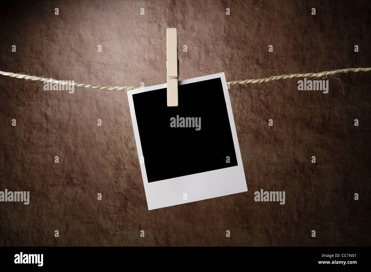 Empty instant photo on grunge background Stock Photo - Alamy